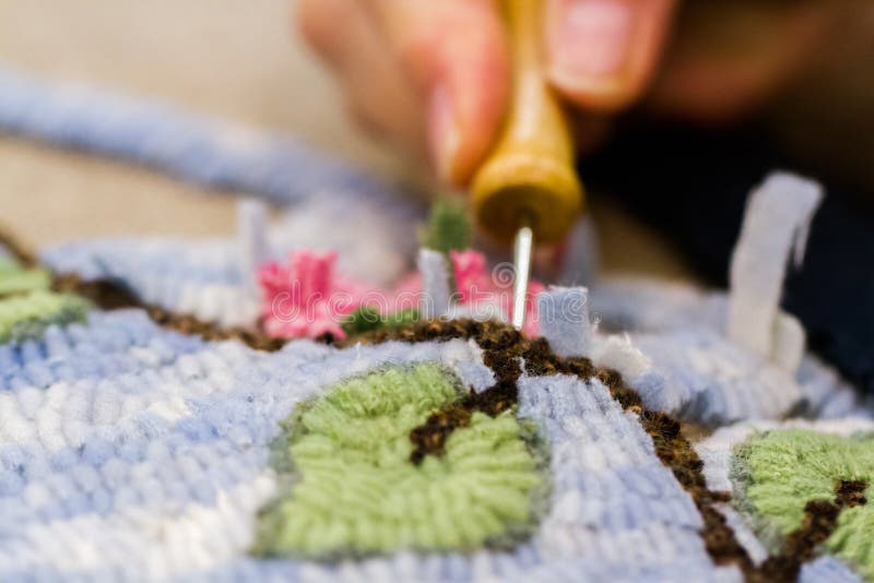 Rug hooking stock image. Image of hands, people, hooking - 287760317