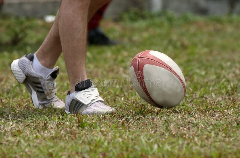 Rugby ball in hands editorial photo. Image of league - 42645801