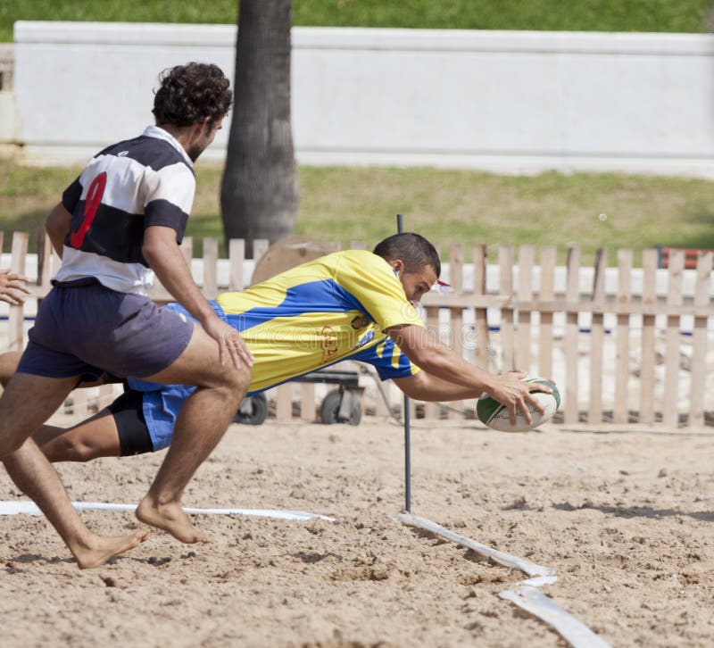 Rugby beach editorial photography. Image of ball, player - 22996962