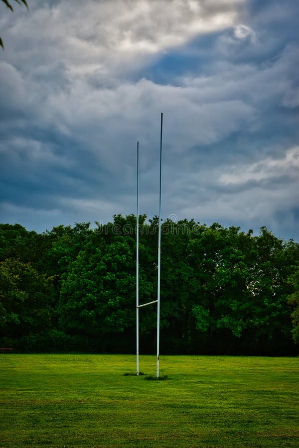 Rugby Goalpost on a Grassy Field Stock Photo - Image of power, grass ...