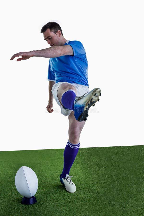 Rugby Player Doing a Drop Kick Stock Image - Image of sports, blue ...