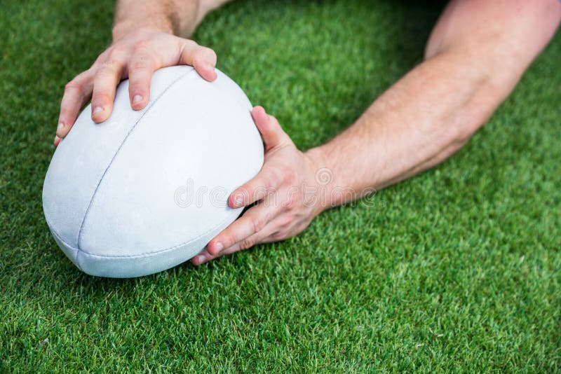 Rugby player scoring a try stock photo. Image of strong - 58180896
