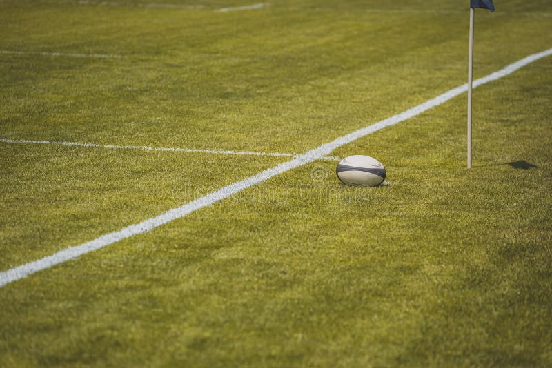 Rugby Playground with Ball and Flag Stock Photo - Image of positioning ...