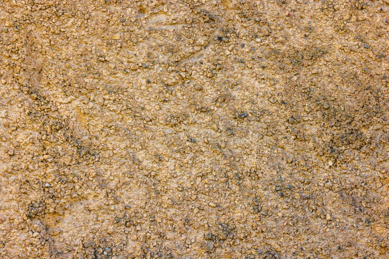 Rugged Beige Concrete Wall Texture with Pebbles Stock Photo - Image of ...