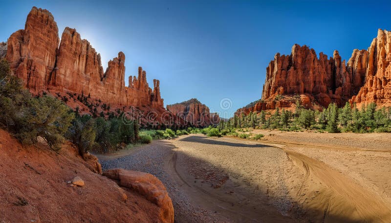 Rugged Canyon Features Striking Red Cliffs and Lush Greenery. Landscape ...
