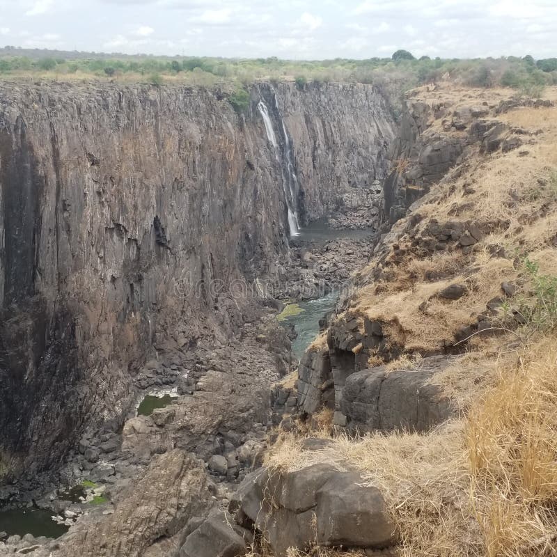 Victoria Falls Zambia from Zimbabwe Stock Photo - Image of ridge, wall ...
