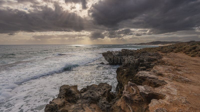 Rugged Coastline with Approaching Sunset. Stock Photo - Image of ...