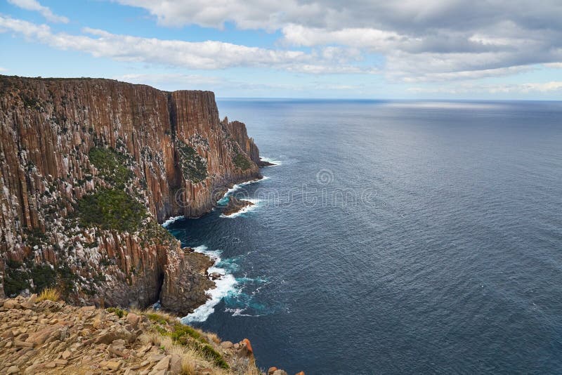 Rugged coastline cliffs stock photo. Image of landmark - 94644636