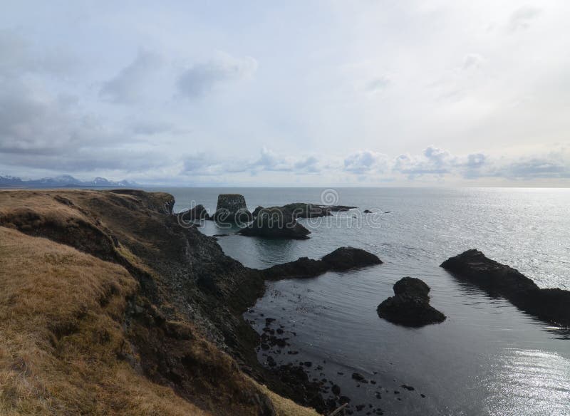 Rugged Coastline Off of Arnarstapi in Iceland Stock Photo - Image of ...