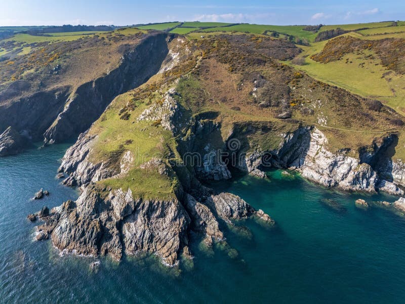 Rugged Devon Coastal Landscape with Cliffs and Turquoise Waters. Stock ...