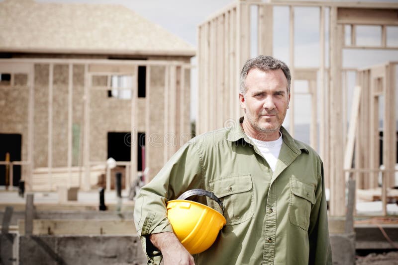 Rugged Male Construction Workers on the Jobsite Stock Photo - Image of ...