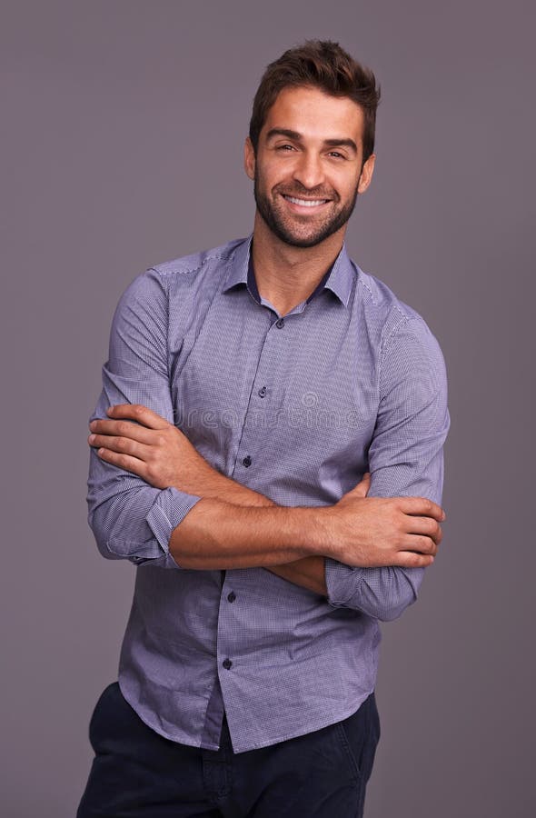 Rugged and Manly. a Rugged Young Man Leaning Against a Wall and Running ...
