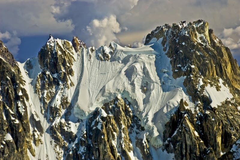 Rugged Mountain Peak stock photo. Image of cloud, high - 10839444
