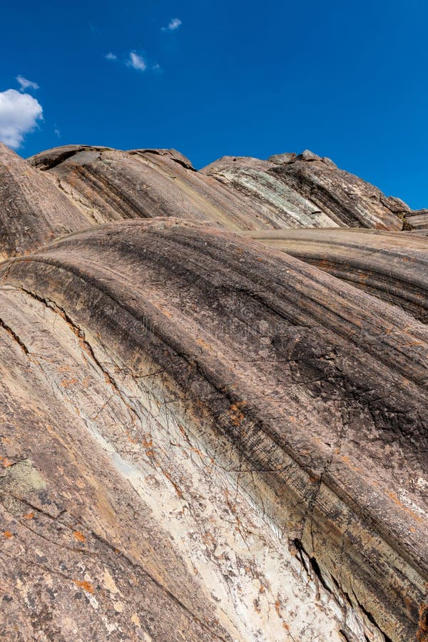 Rugged Rock Formation Beneath a Clear Blue Sky. Stock Photo - Image of ...