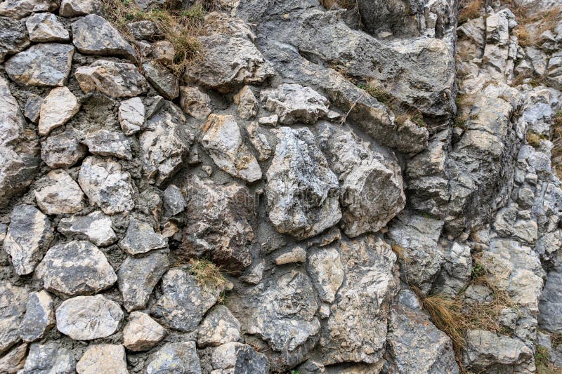 Rugged Rocky Cliff Face Natural Stone Texture Vegetation Stock Photos ...
