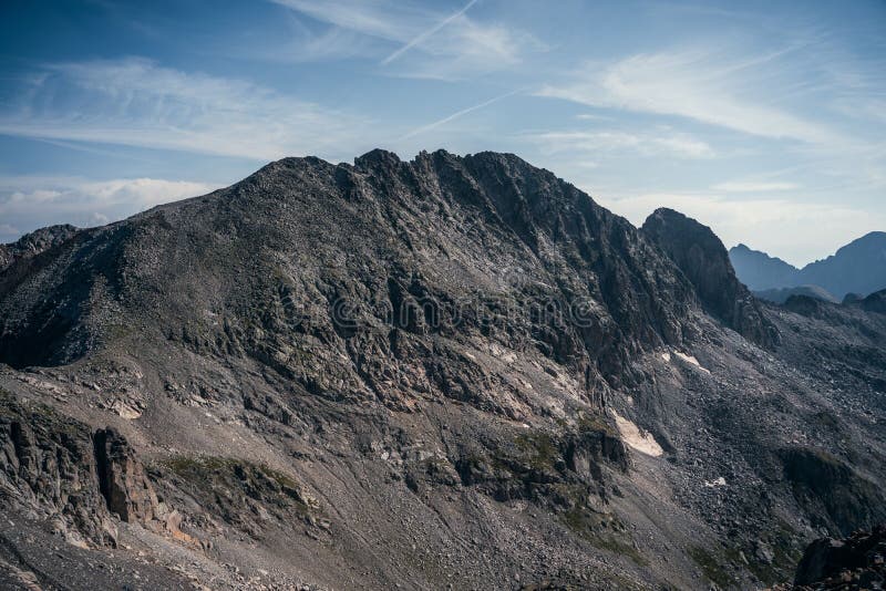 Rugged, Rocky Mountains Range Captured Against the Blue Sky Stock Photo ...