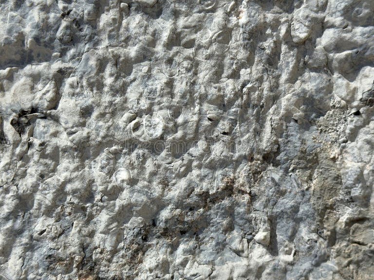Rugged Texture of Weathered Gray Stone Surface with Visible Erosion ...