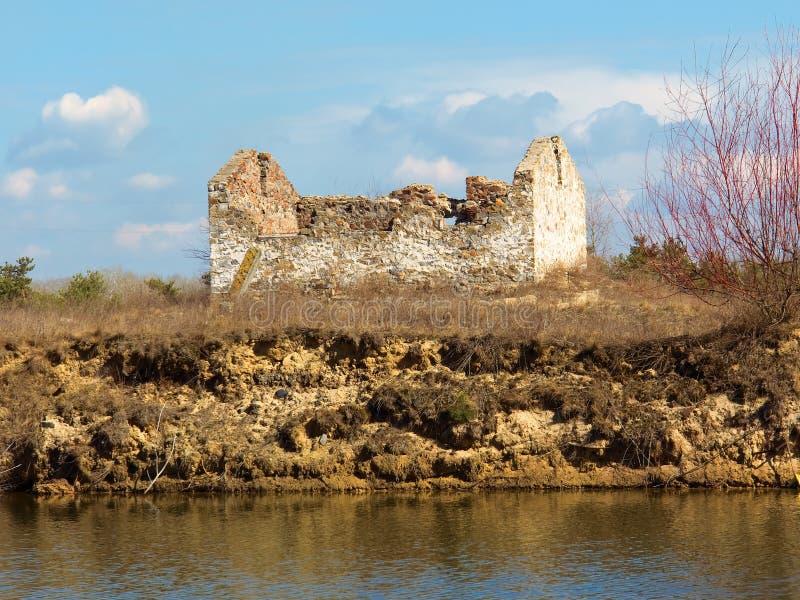 Ruin on a lake shore stock image. Image of desolate, grass - 2223899