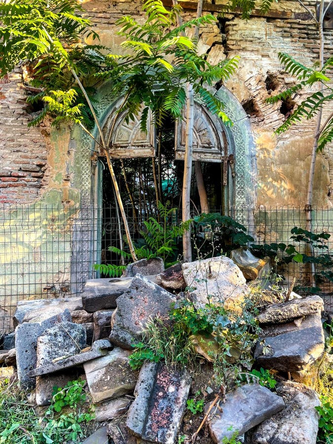 Ruined gate in Georgia stock photo. Image of garden - 225025242