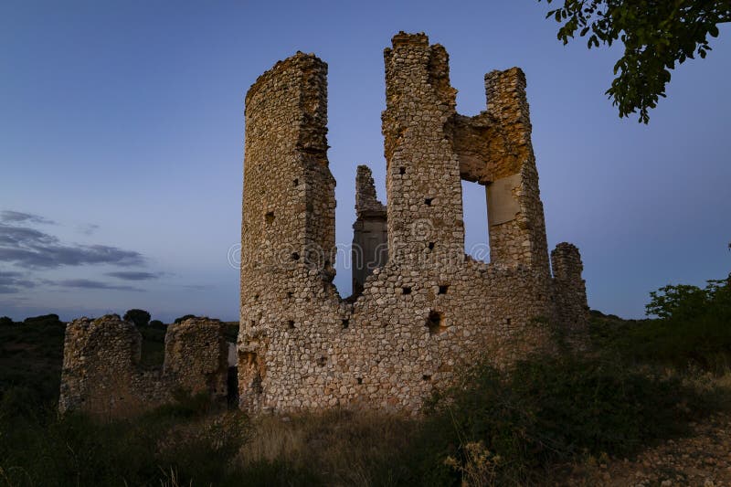 Ruins of an Ancient Stone Structure at Dusk Surrounded by Natural ...