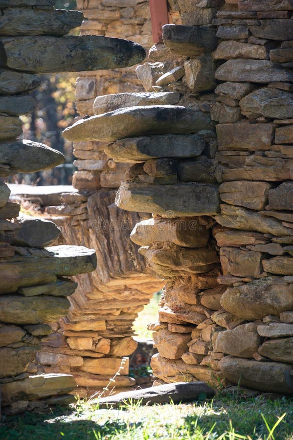 The Ruins of an Antique House Built of Rock and Stone Stock Image ...