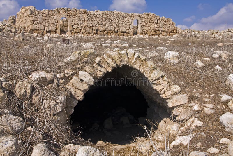 Ruins in a dry field stock image. Image of doors, cave - 11598325