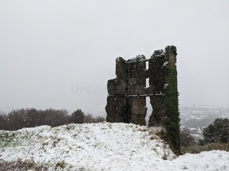 Ruins of a Snow-covered Unknown Castle on Top of the Hill in Winter ...