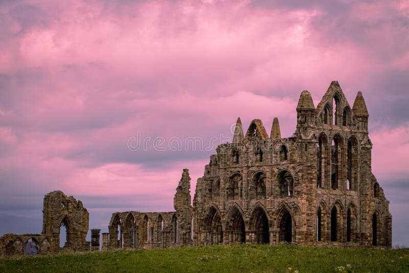 Whitby Abbey at sunset stock photo. Image of harbour - 219883428