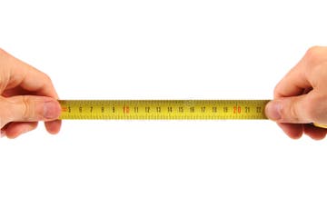 Ruler in the hands stock photo. Image of precision, instrument - 20714334