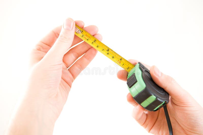 Tape measure in hands stock image. Image of inch, tool - 14740395