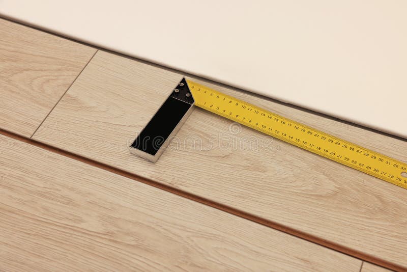 Ruler and Parquet Planks on Floor in Room Stock Photo - Image of panel ...