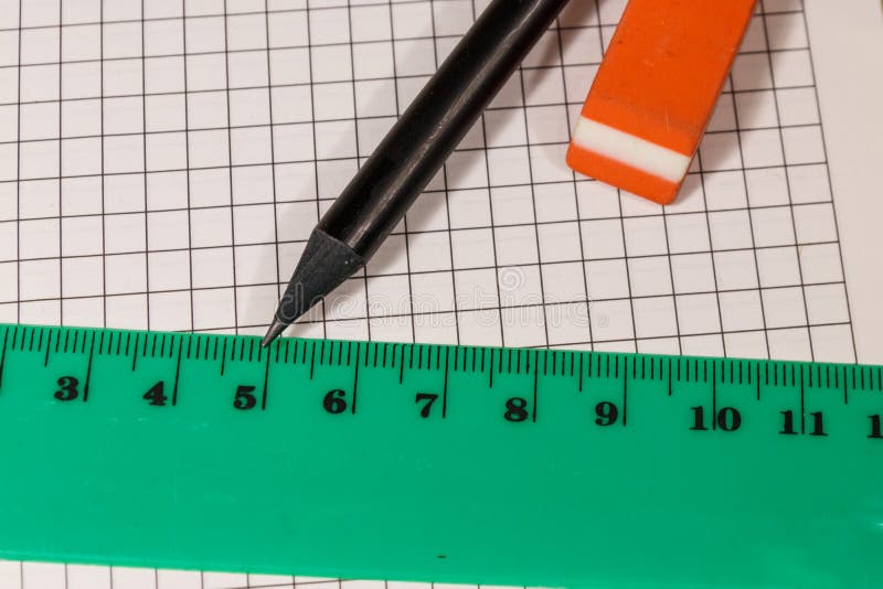 Ruler, Pencil and Eraser on Notepad Sheet Stock Image - Image of memo ...