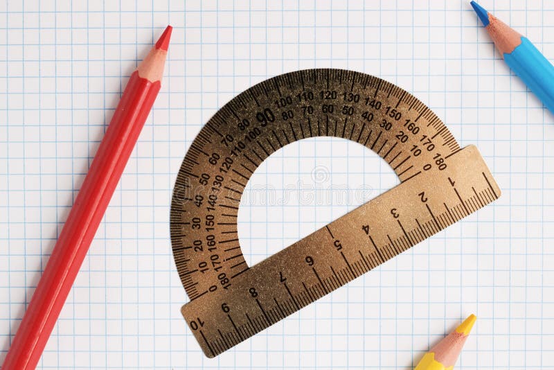 Ruler Protractor and Pencils on a Notebook Sheet Stock Photo - Image of ...
