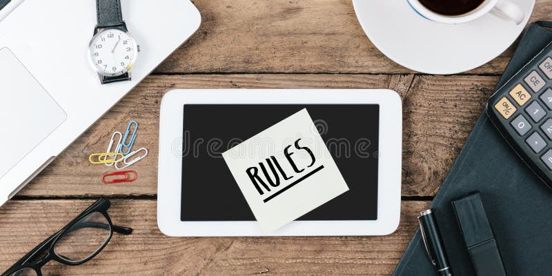 Rules on Note on Office Desk with Computer Technology, High Angle Stock ...