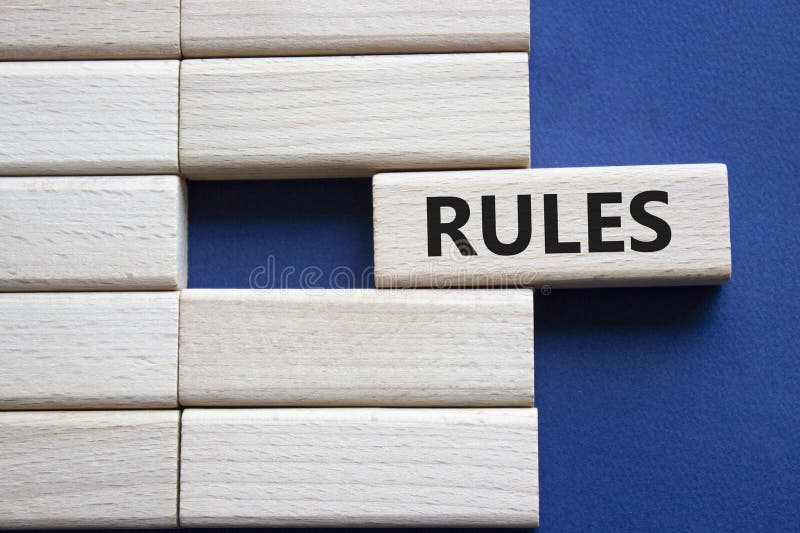 Rules Symbol. Wooden Blocks with Word Rules. Beautiful Deep Blue ...