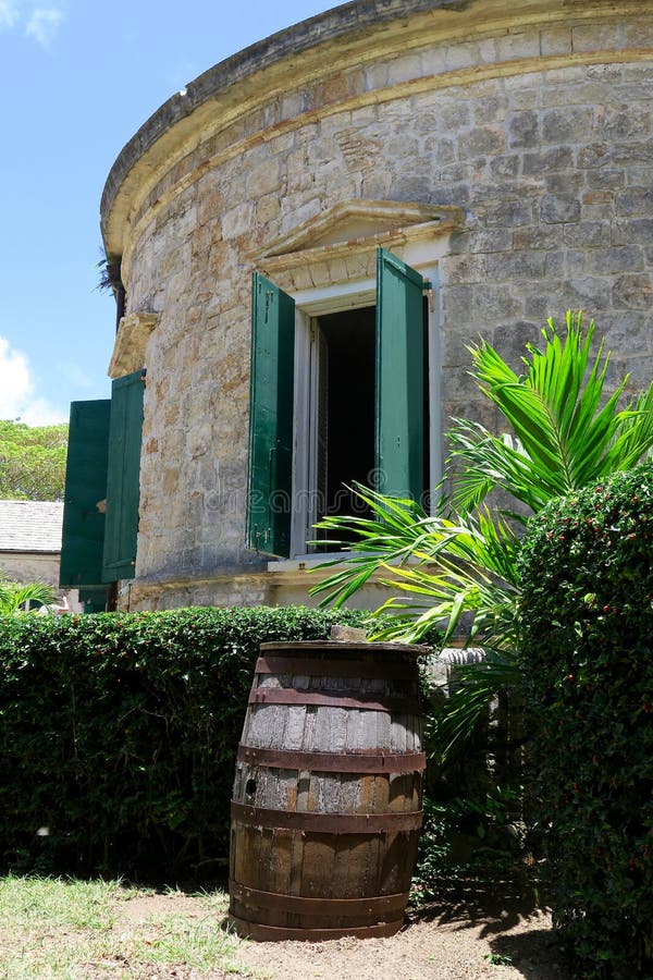 Rum Barrel and Old Stone Building Stock Image - Image of setting, house ...