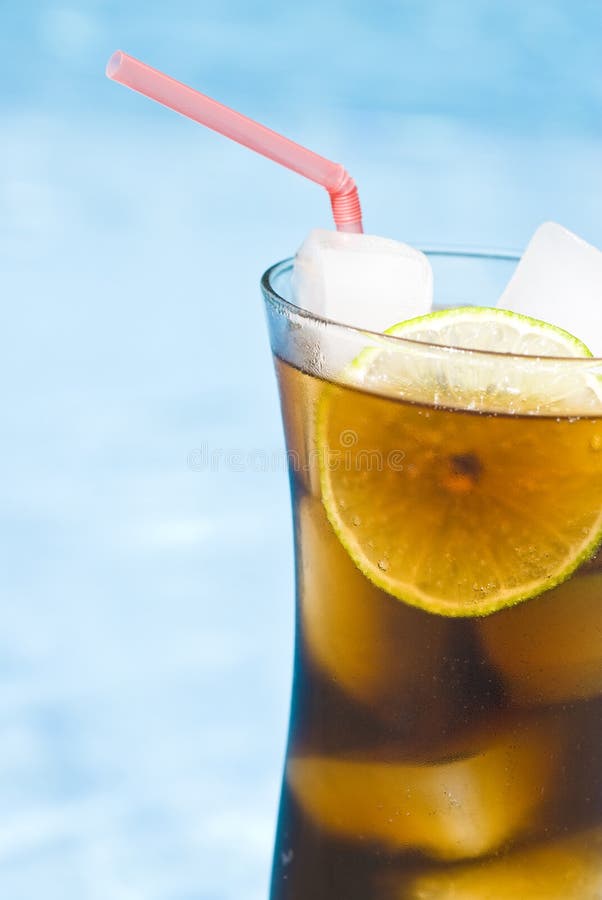 Rum and Cola by the Pool stock image. Image of cocktail - 10454109