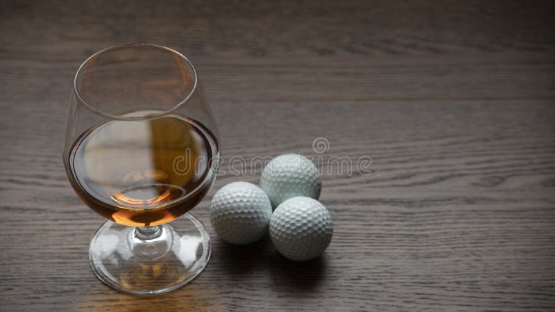 CUP of RUM with GOLF BALLS on HIGH CONTRAST Stock Image - Image of ...