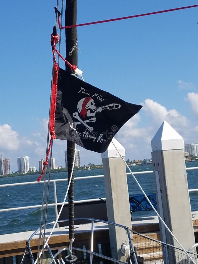 Rum & pirate flags stock photo. Image of water, flags - 131944550