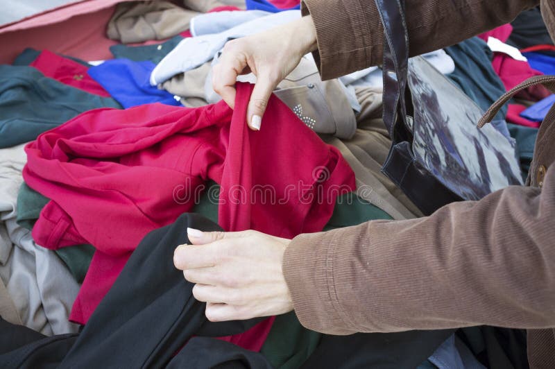 Rummaging on a Clothes Stall Stock Photo - Image of sale, horizontal ...