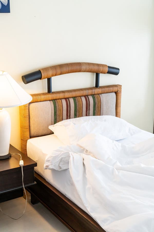 Rumple pillow on bed stock photo. Image of rumpled, comfortable - 152928154