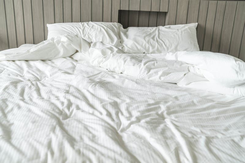 Rumpled Bed with White Messy Pillow Decoration in Bedroom Stock Image ...
