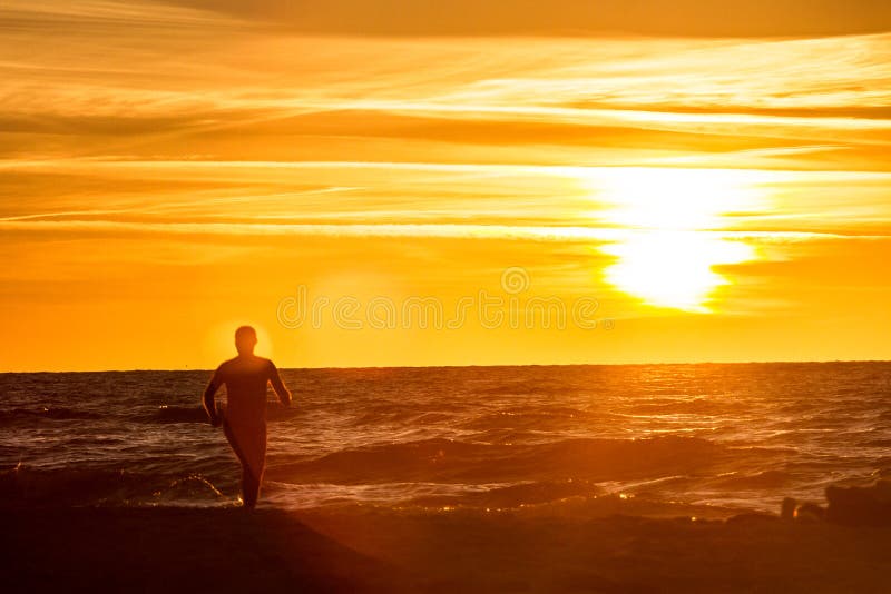 Run beach at sunset stock photo. Image of athlete, person - 58226032