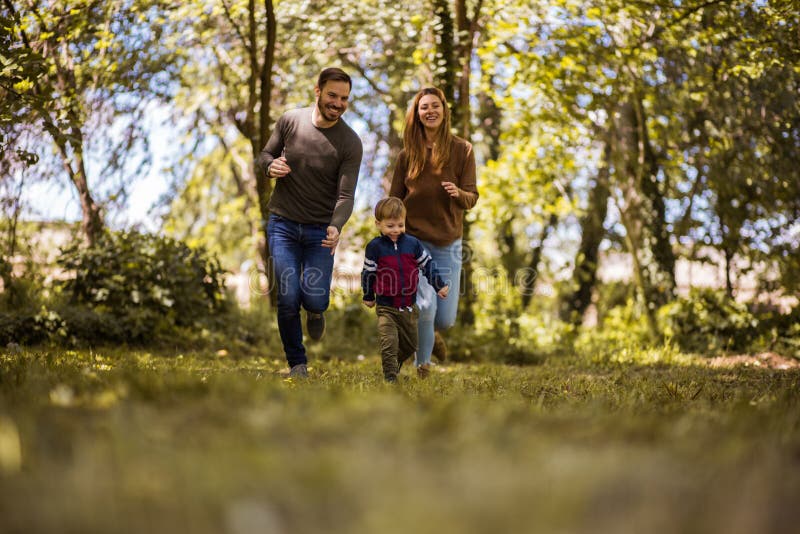 Run and catch the fun stock image. Image of child, parents - 182823805