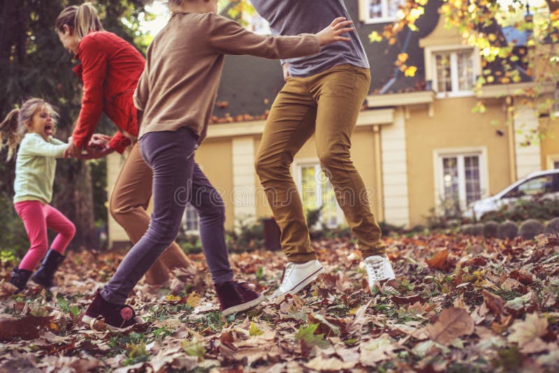 Run, Jump, Fun. Family Time. Stock Photo - Image of jumping, care ...