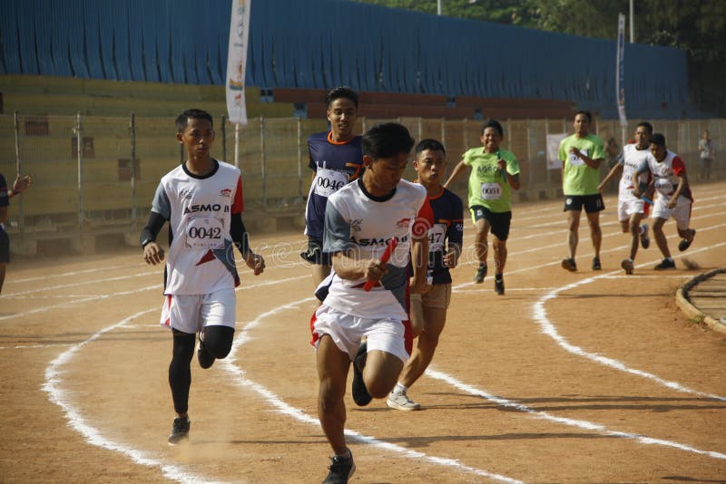 Run the men relay editorial image. Image of relay, fast - 156991770