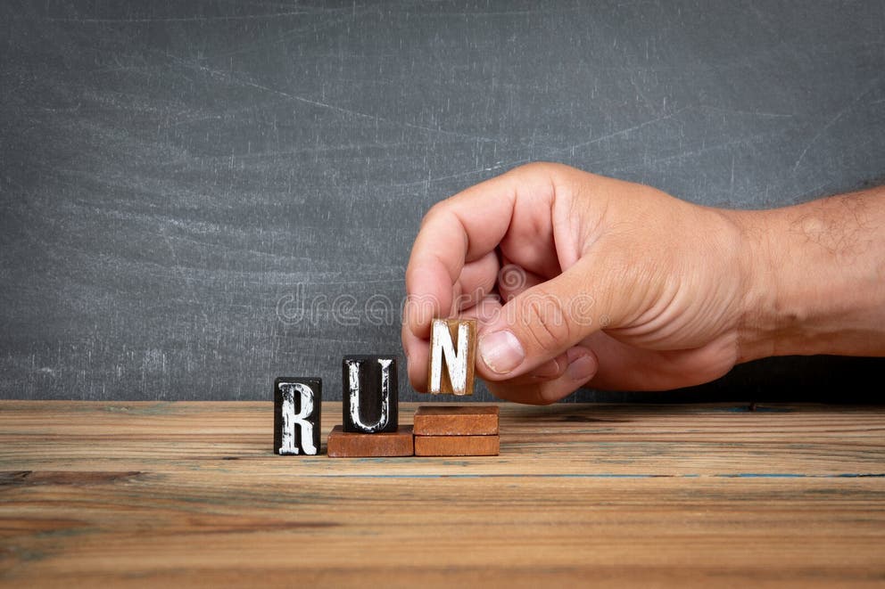 RUN. Wooden Letters, Alphabet Blocks on Steps Stock Image - Image of ...