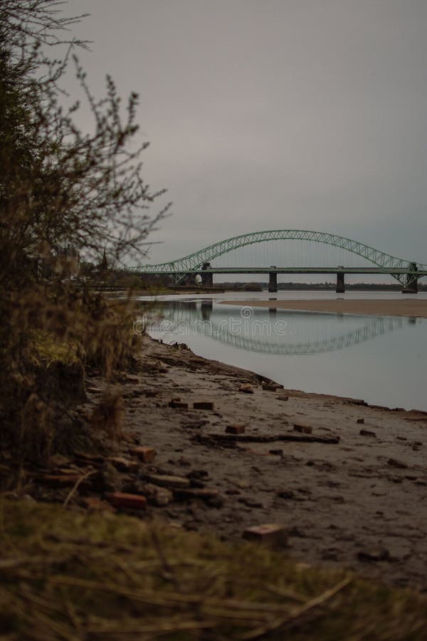 Runcorn Bridge or Silver Jubilee Bridge in the Background in Runcorn ...