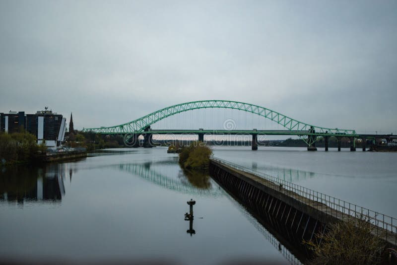 Runcorn Bridge or Silver Jubilee Bridge in the Background in Runcorn ...