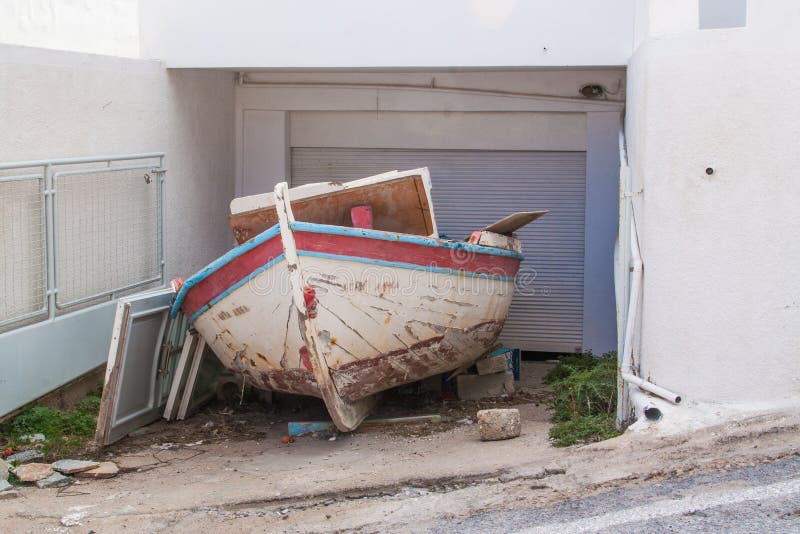 Rundown Boat in Storage at Home in Santorini Greece Stock Image - Image ...